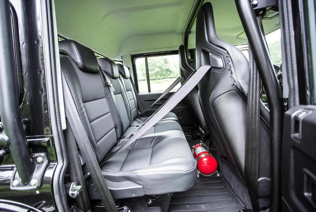 BOND VILLIAN DEFENDER SVX GOES UNDER THE HAMMER! - JUST CARS